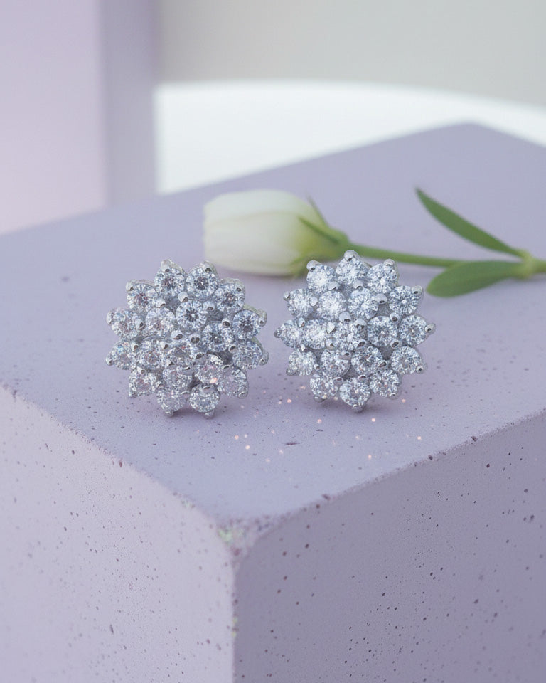 Cluster of round shape CZ in a flower shape stud earring. – IOV